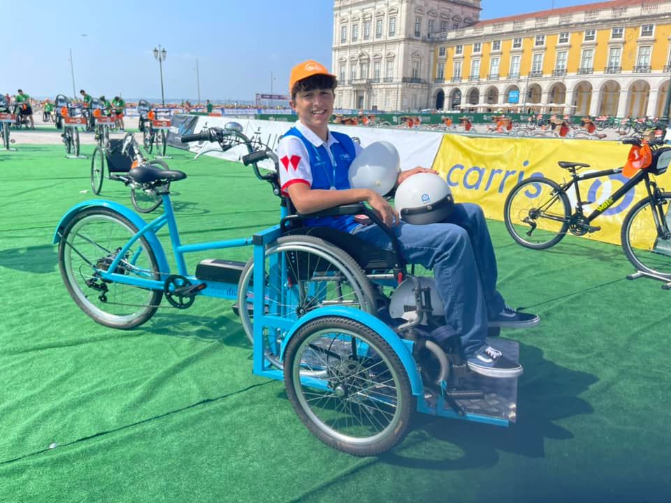 An adapted bicycle that allows people in wheelchairs to go sightseeing ...